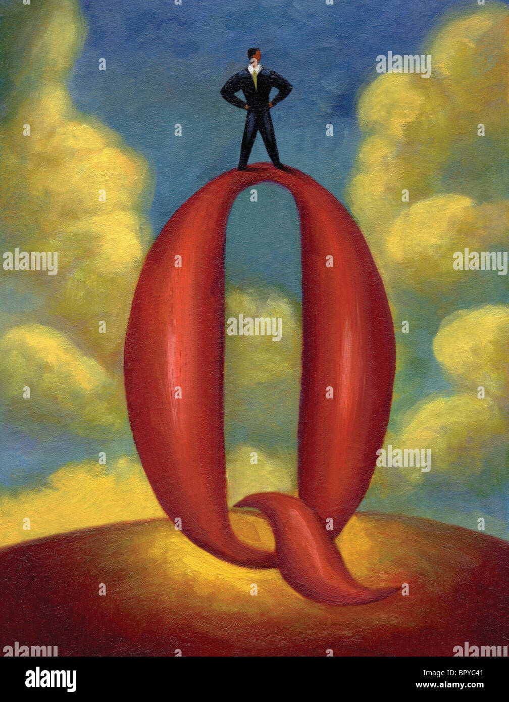 A businessman standing on a giant letter Q Stock Photo - Alamy