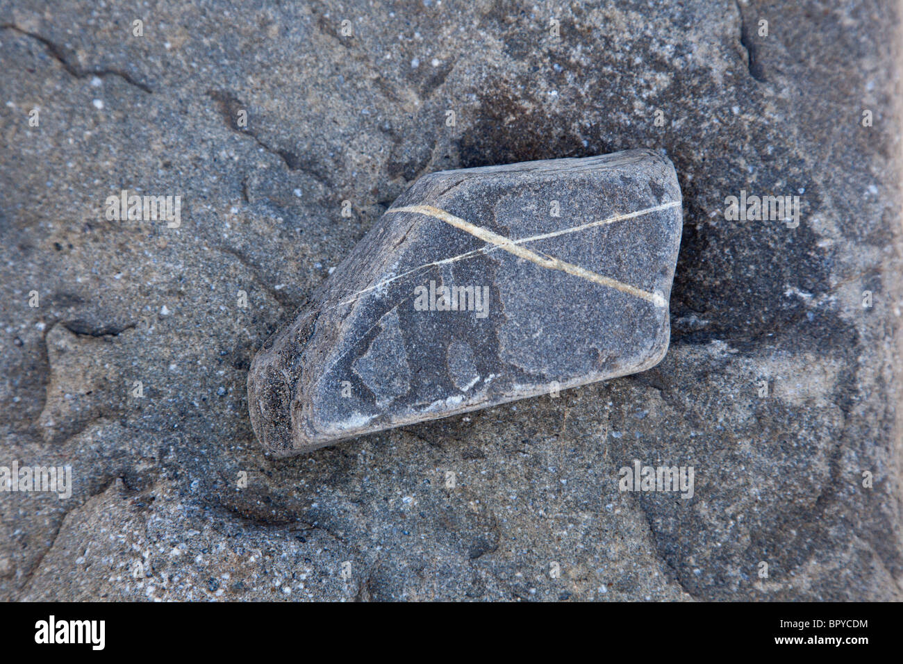 grey rock with x shape Stock Photo - Alamy