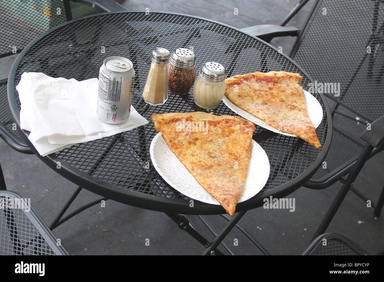 Slices Of Pizza With A Coke