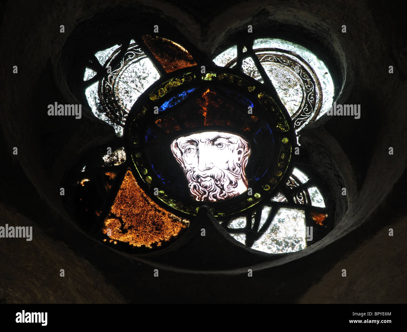 Medieval stained glass in St. Edward`s Church, Evenlode ...