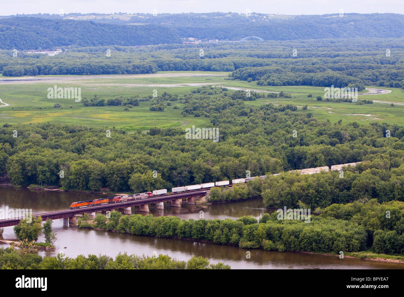 A BNSF Railway intermodal freight train crosses the Wisconsin River ...