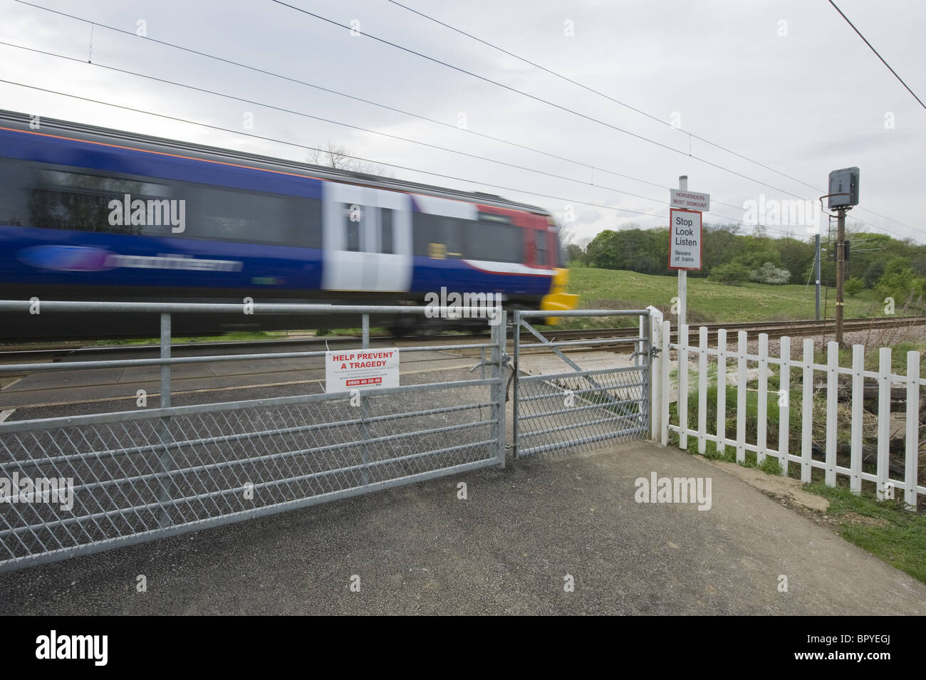 People going through a gate hi-res stock photography and images - Alamy