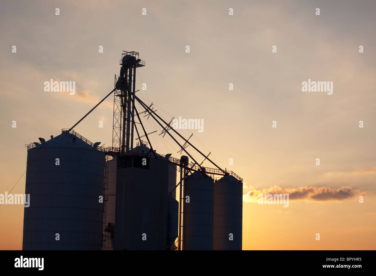 A typical Midwestern grain elevator at sunset Stock Photo - Alamy