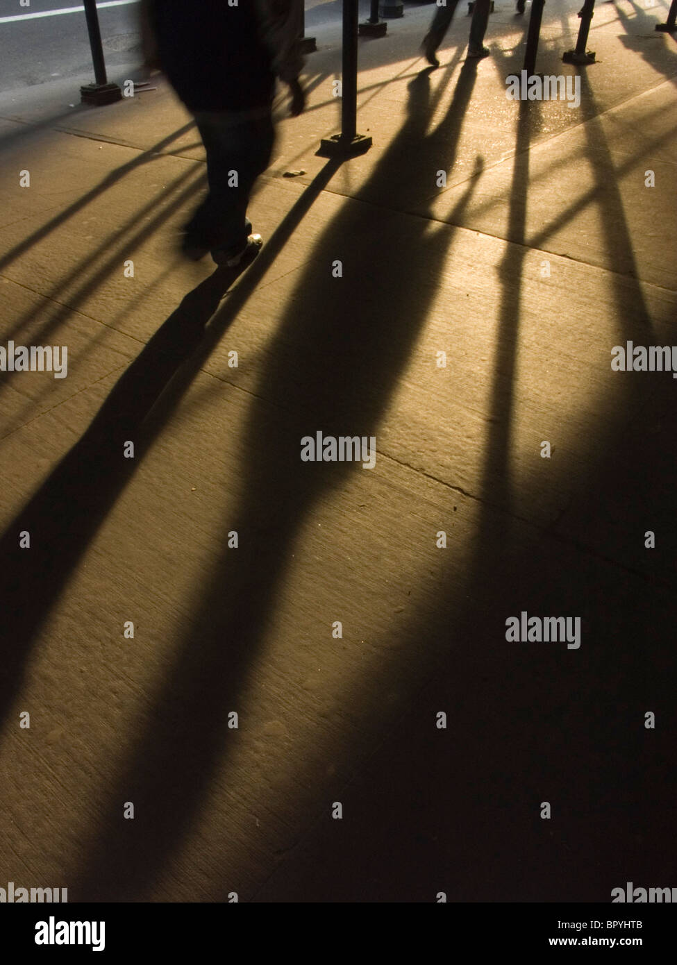 Pedestrians and their shadows in Manhattan, New York City Stock Photo ...