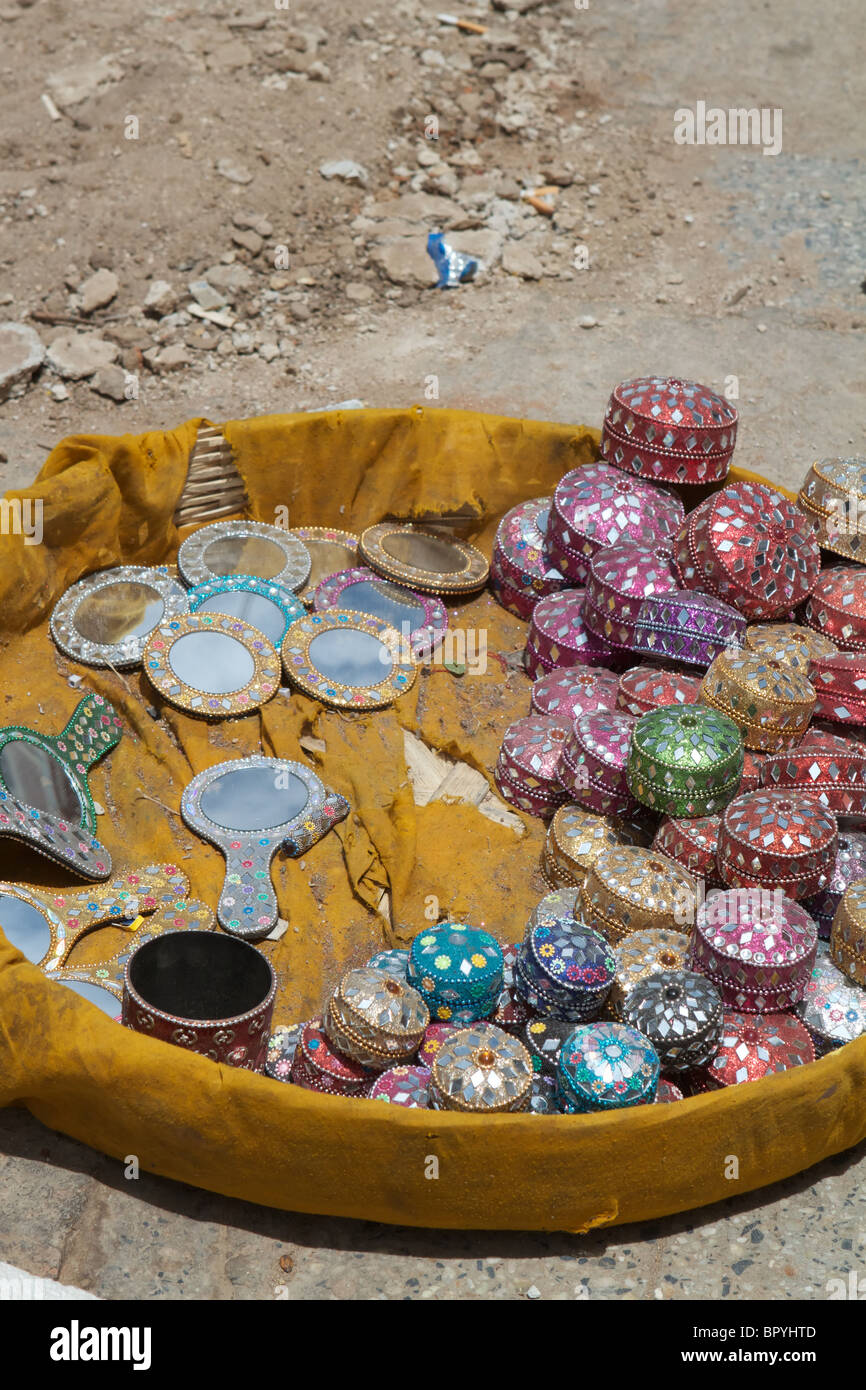 indian make-up boxes and mirrors to sell on a street Stock Photo - Alamy