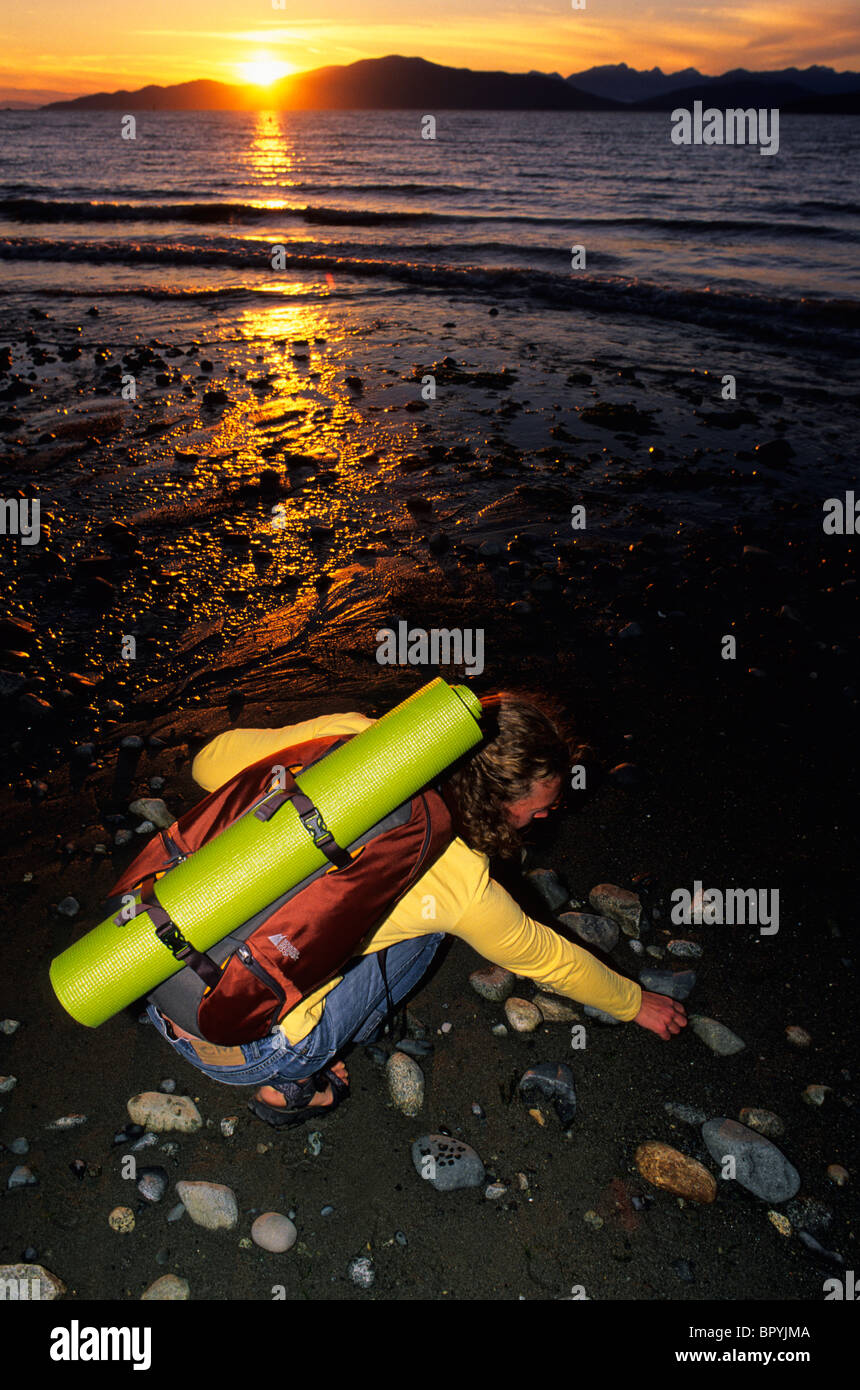 Woman beachcombing hi-res stock photography and images - Alamy