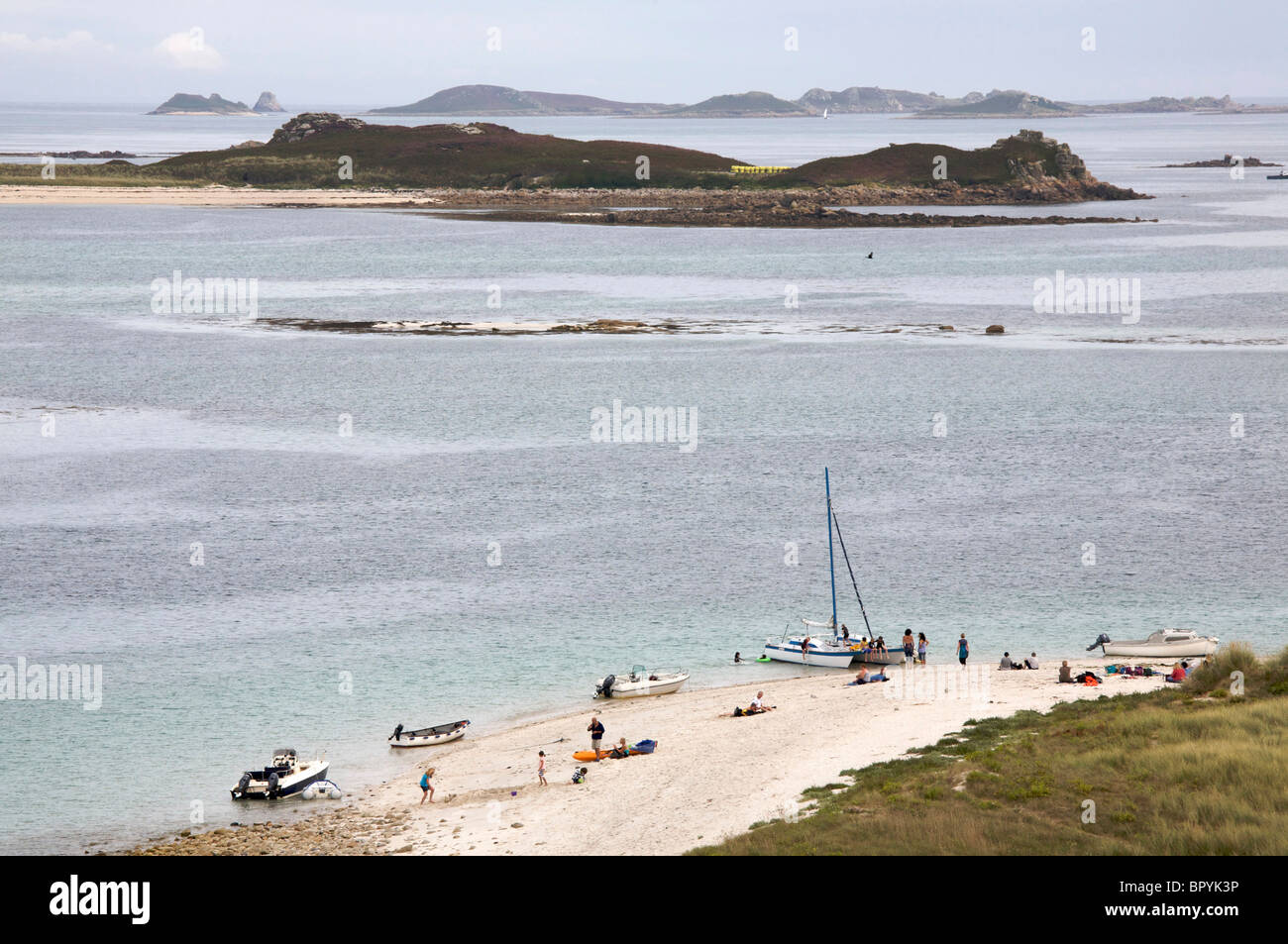 Daytrippers moor their boats on the beach on the Uninhabited Isle of ...