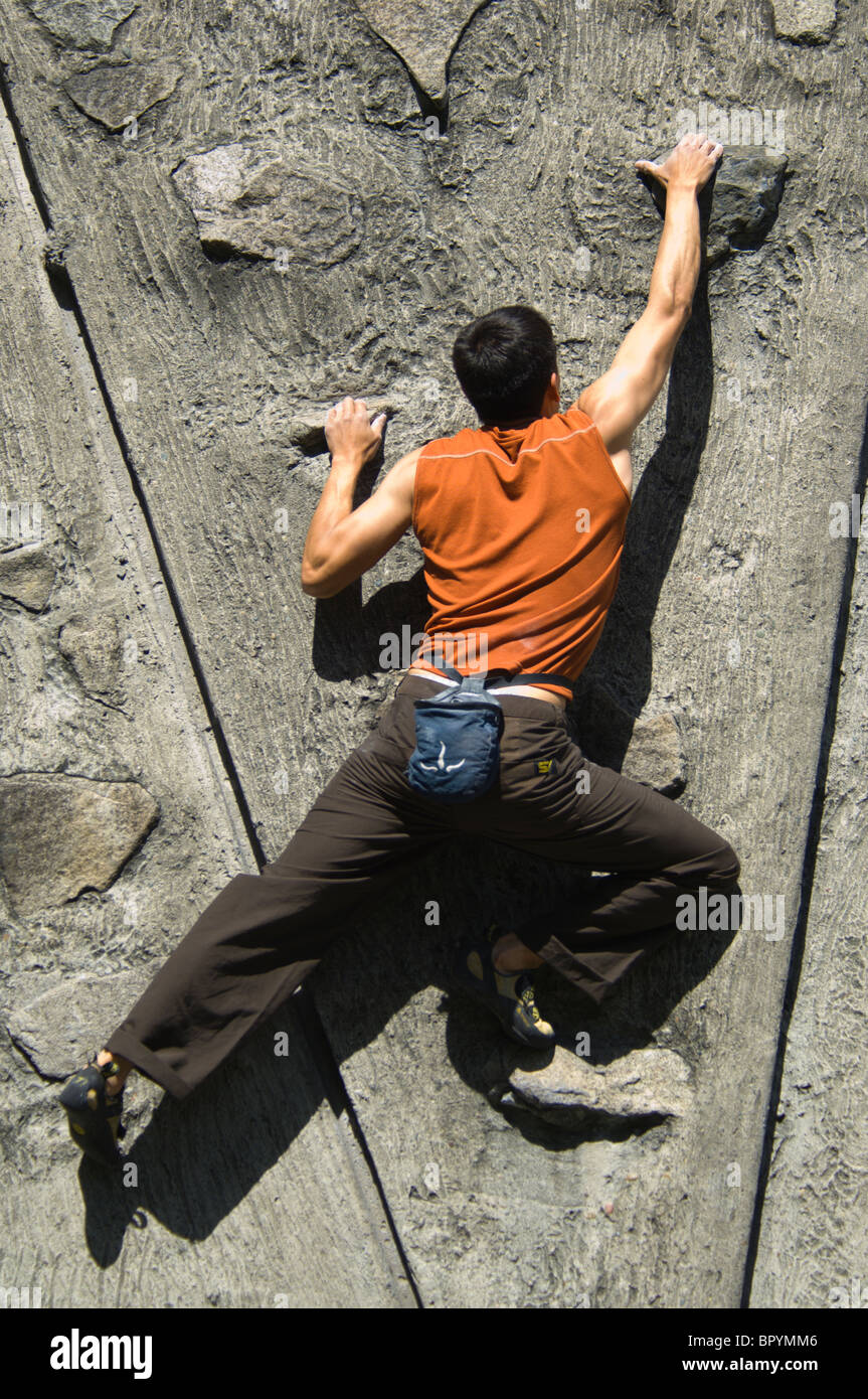 Man bouldering outdoors Stock Photo - Alamy