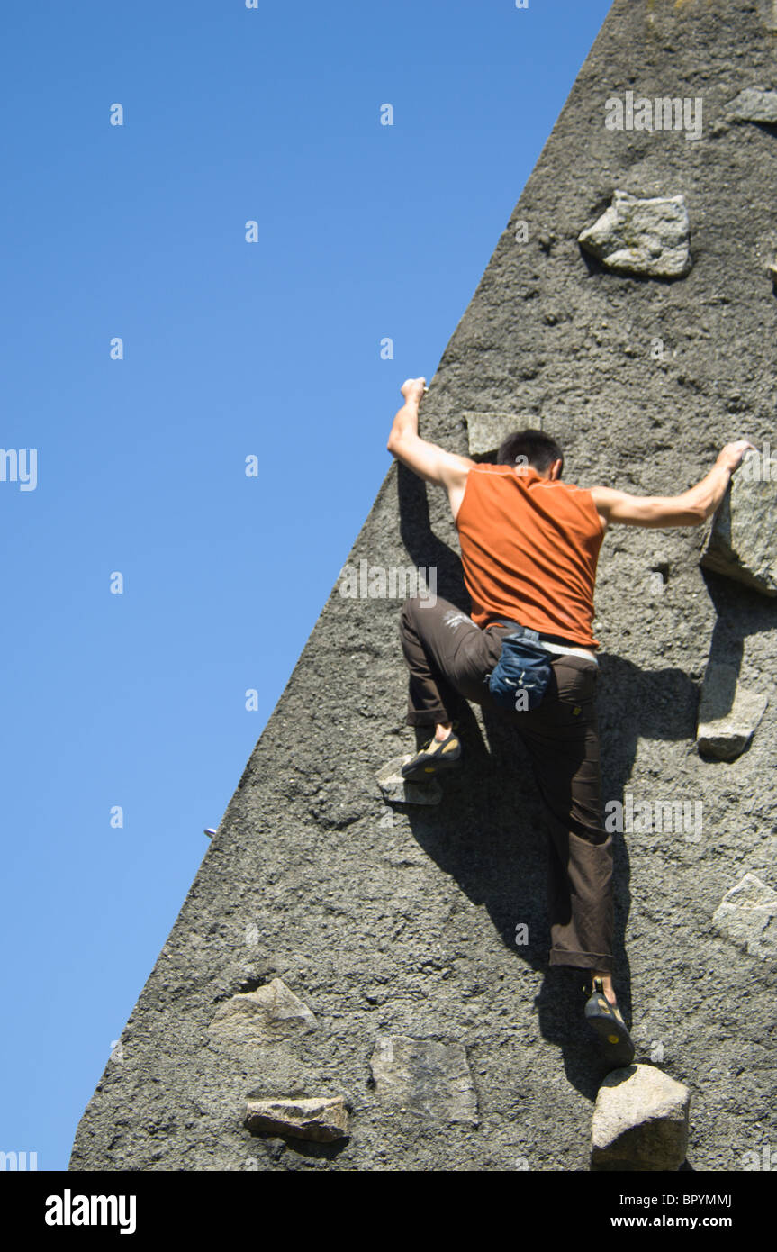 Man bouldering outdoors Stock Photo - Alamy