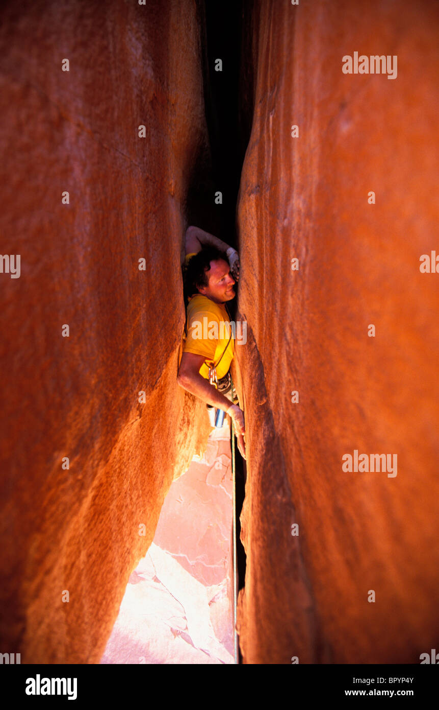 Squeeze through hi-res stock photography and images - Alamy