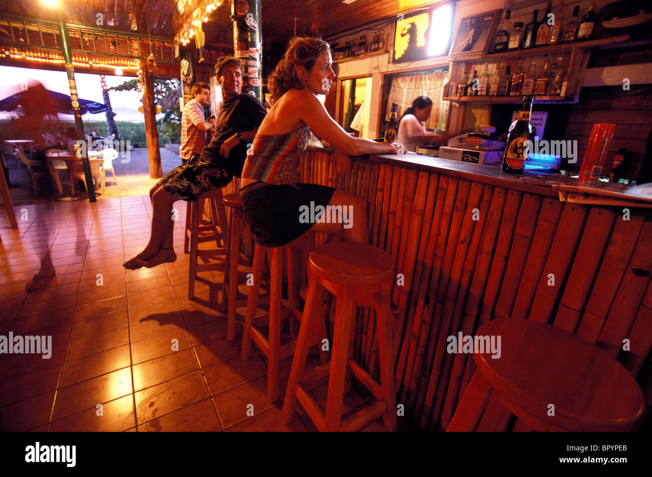 Hanging from a bar hi-res stock photography and images - Alamy