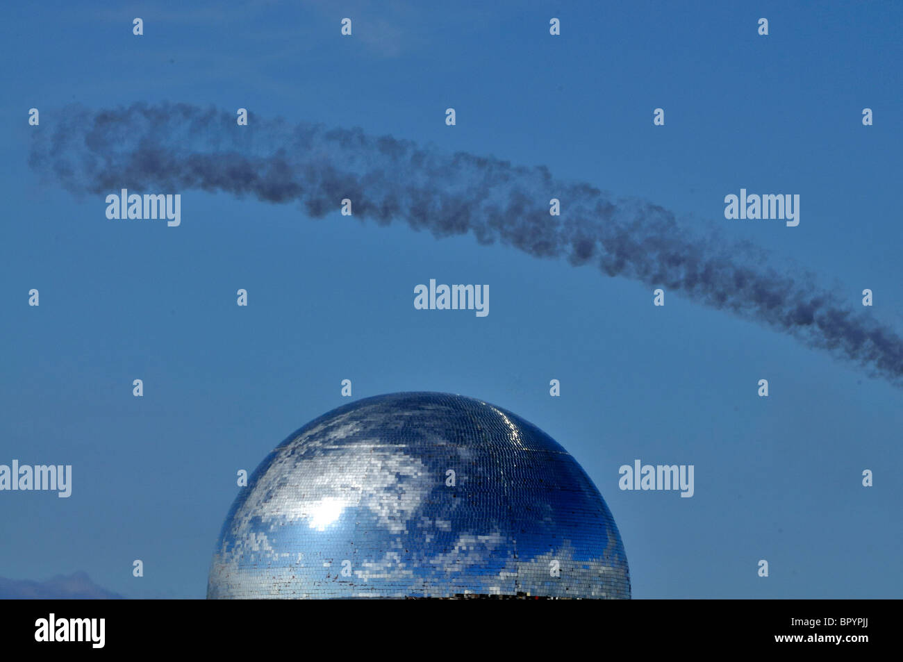 Vapor trails pollution hanging over the world optical illusion Stock ...