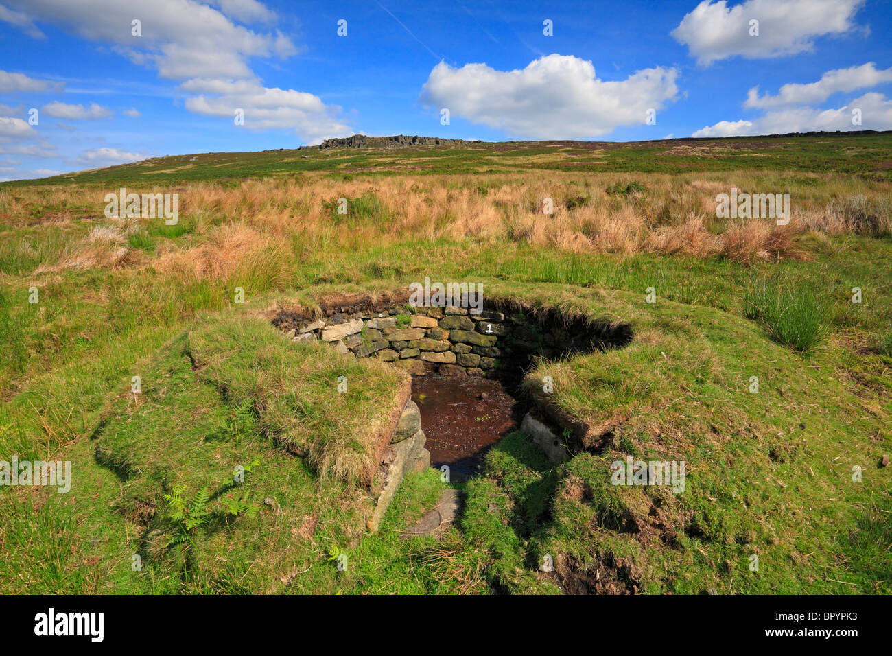 Turf covered grouse butt on Moscar Moor below Stanage Edge, Derbyshire ...