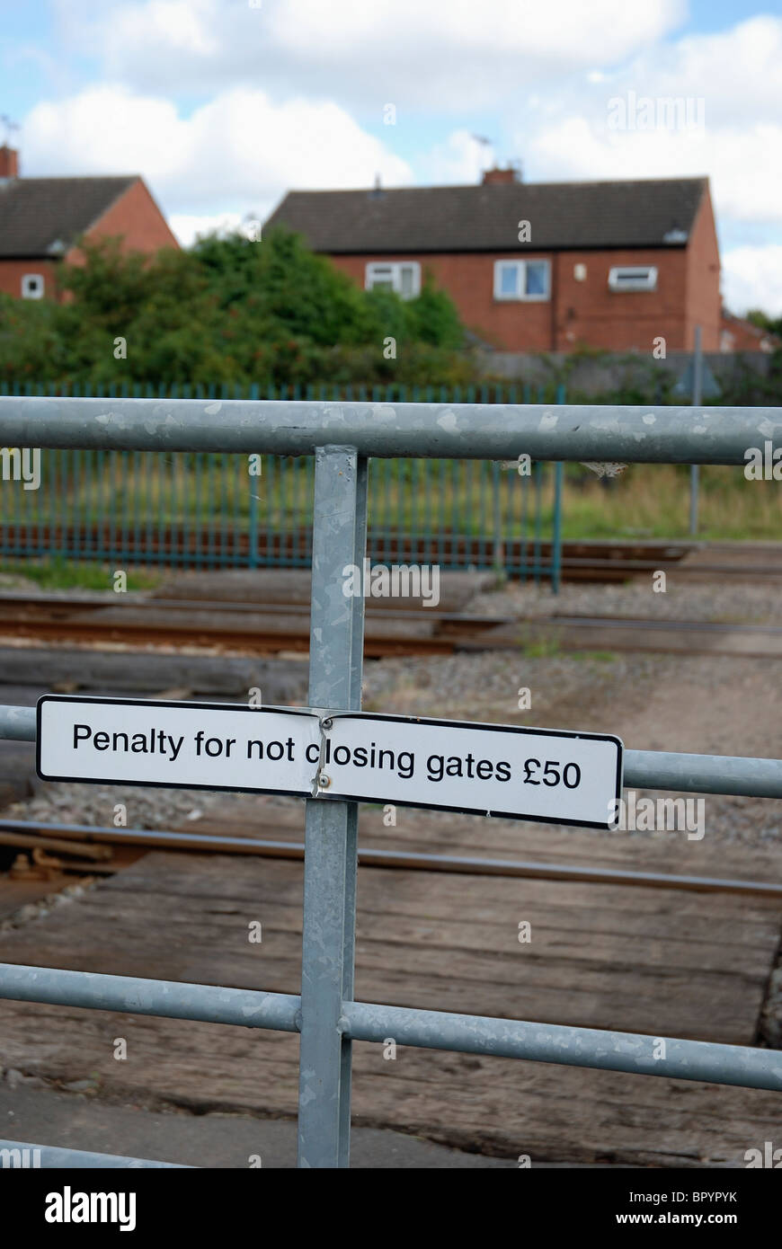 penalty sign at level crossing tram and railway lines england uk Stock ...