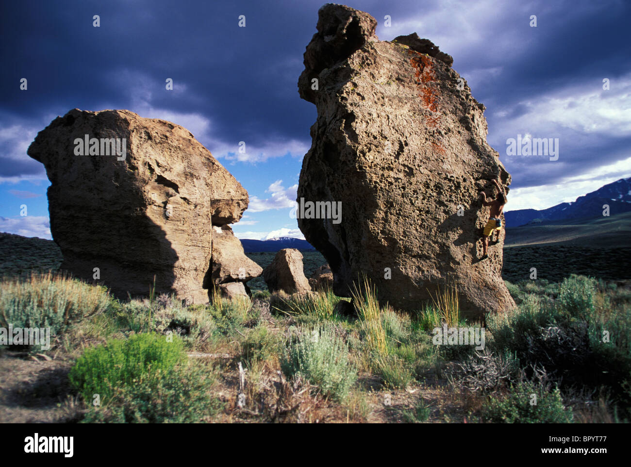 A man on a bouldering problem Stock Photo - Alamy