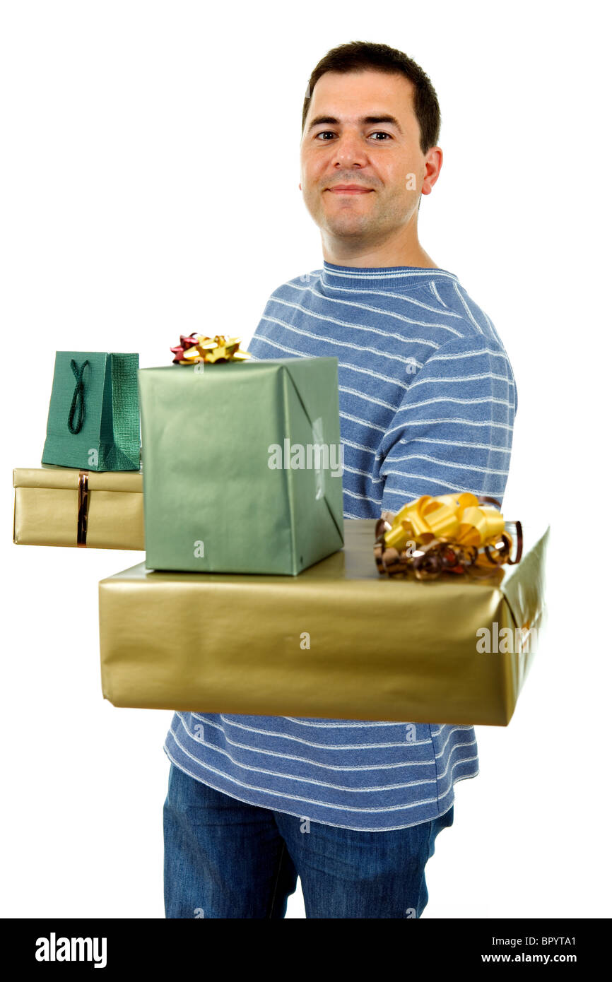 young casual man holding a few gifts, isolated Stock Photo - Alamy
