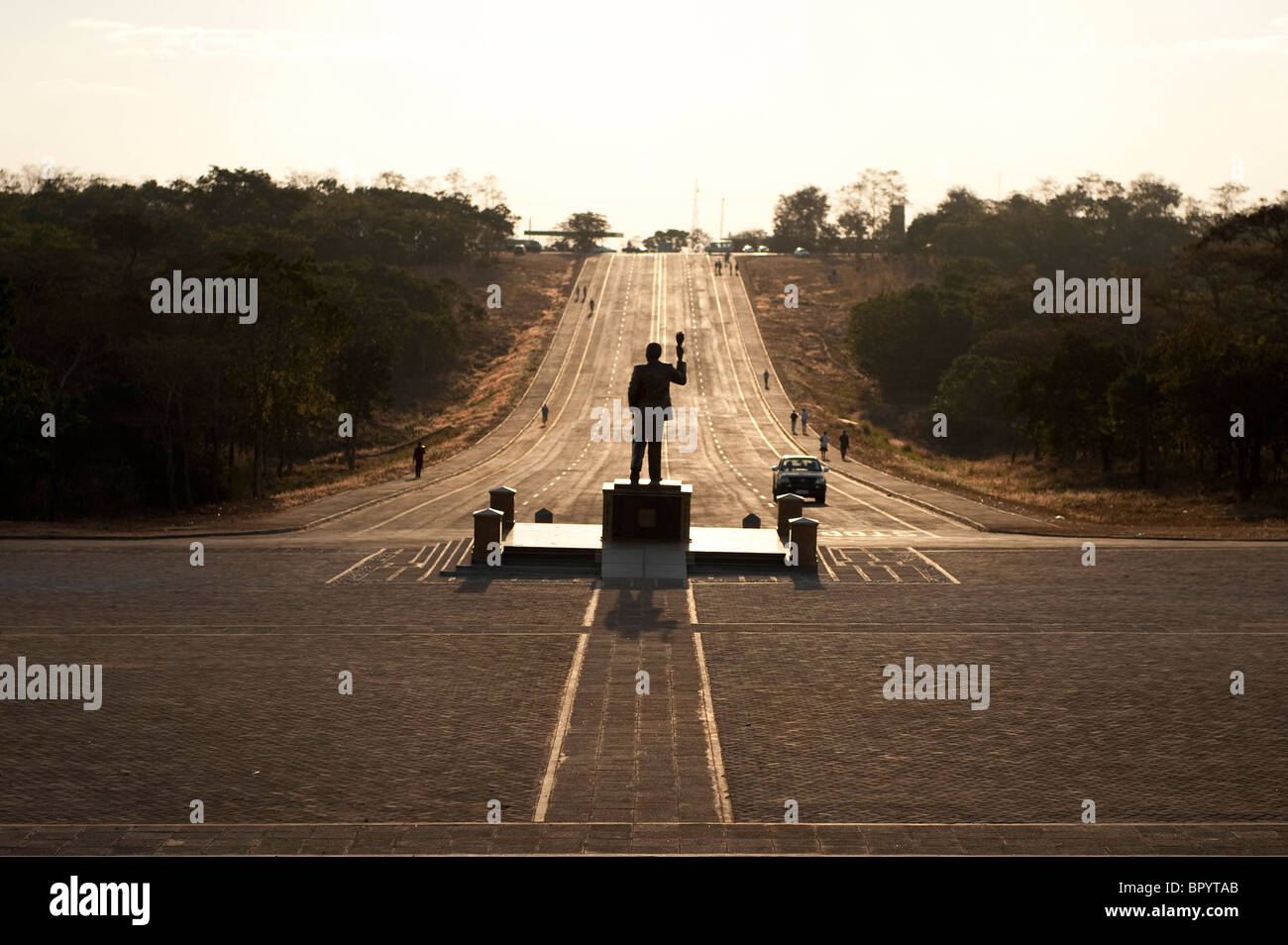 Statue of DR Kamuzu Hastings Banda in front of the Memorial tower to ...