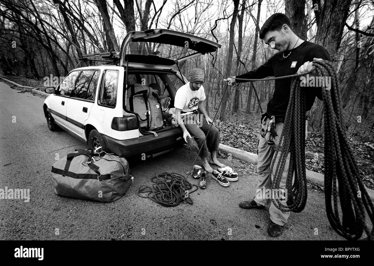 Two men rock climbing Black and White Stock Photos & Images - Alamy