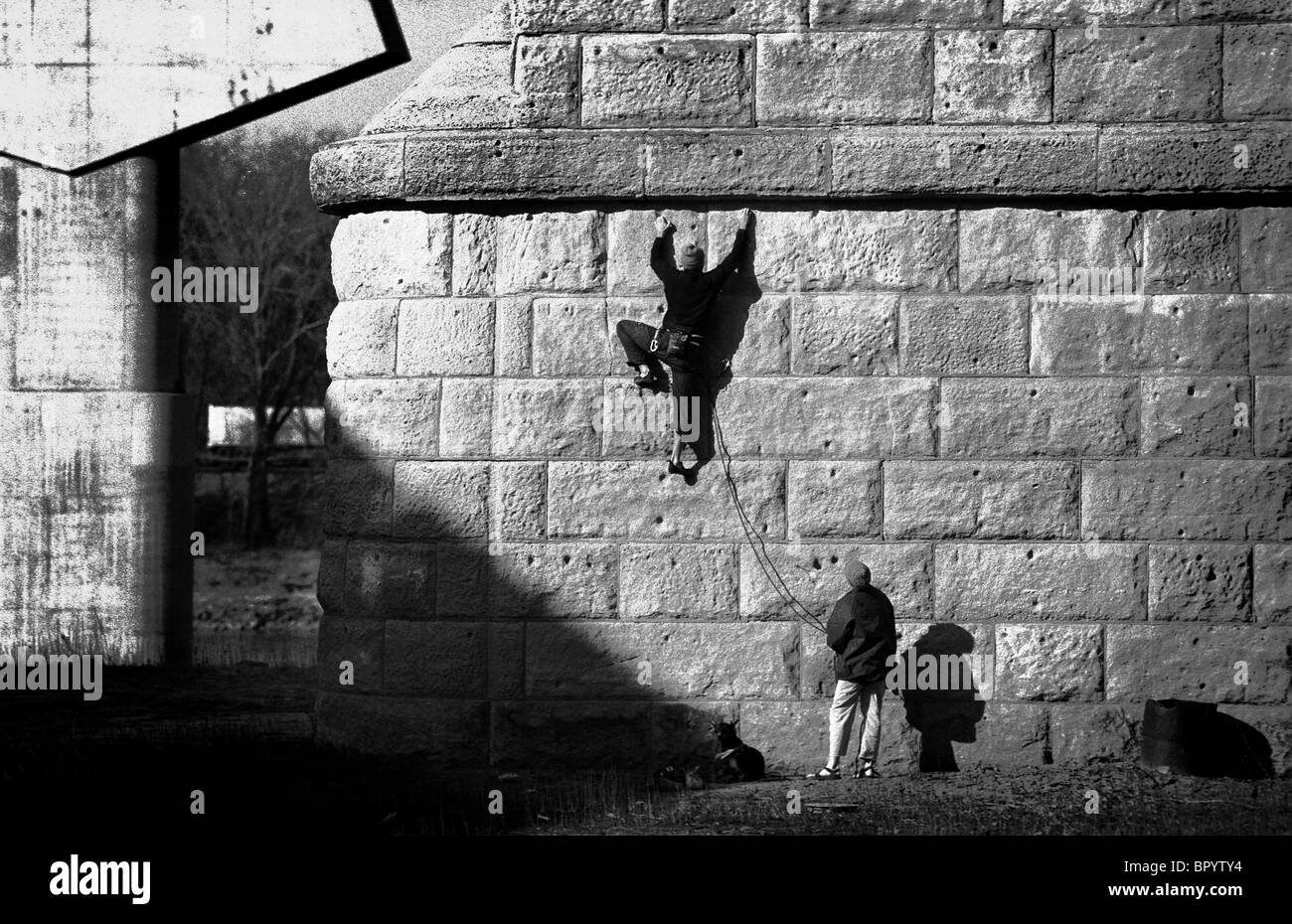 Two men buildering Stock Photo - Alamy