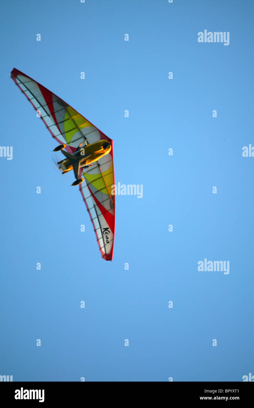 An Air Creation Tanarg trike makes a low fly-by over the crowds at the ...