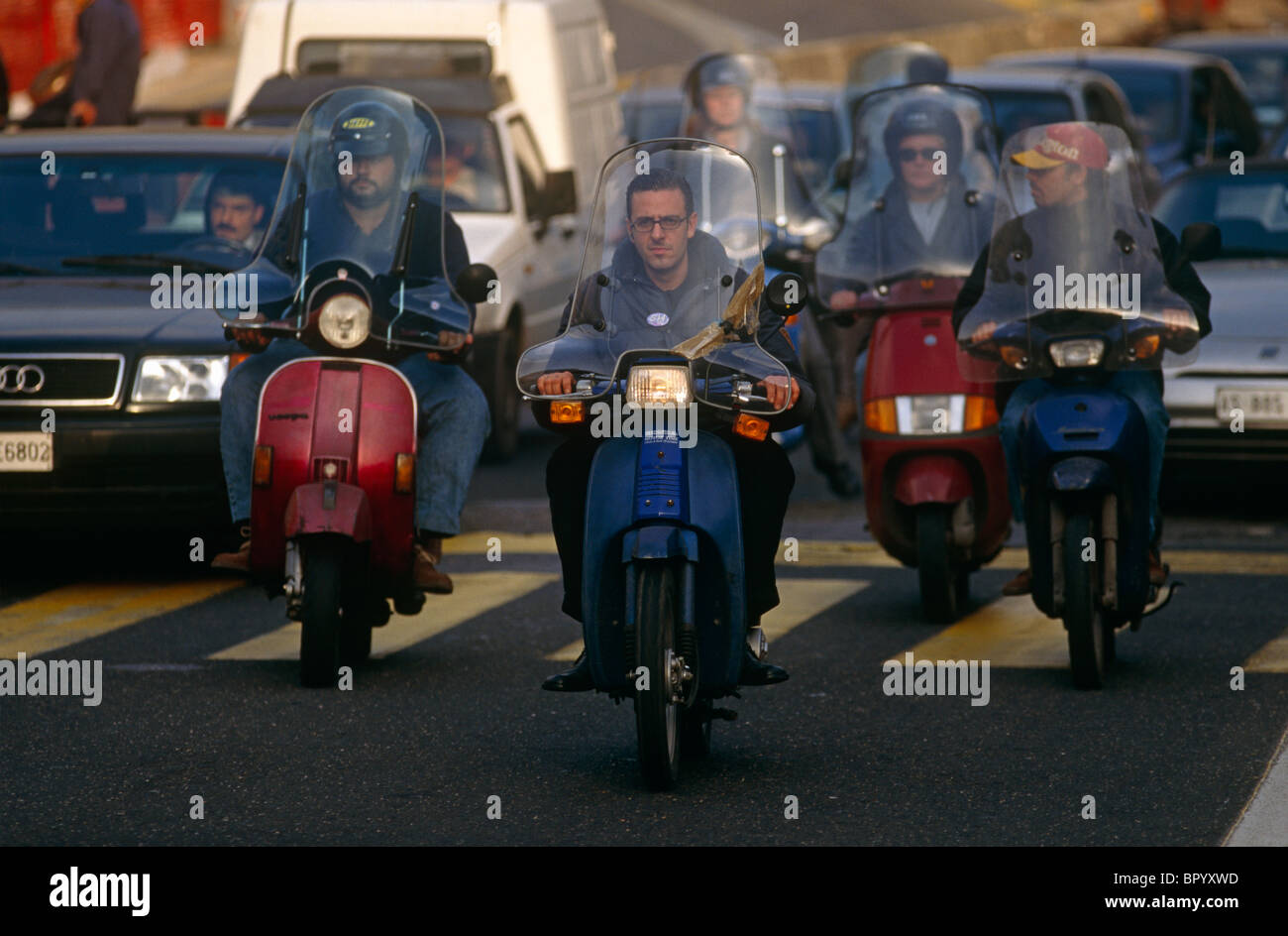 During Rome's chaotic rush hour, we see a fleet of scooters being ...