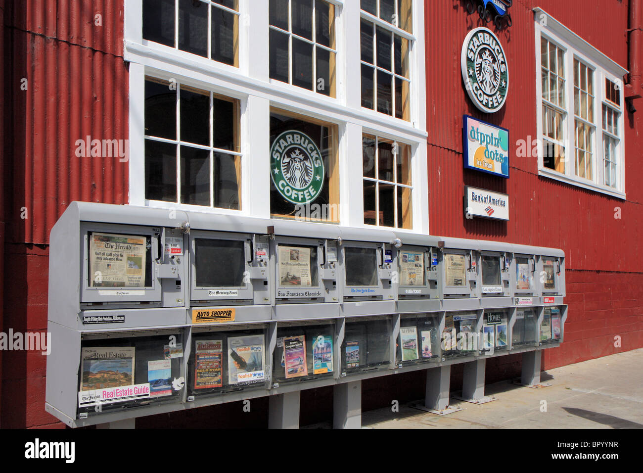 Newspapers boxes in front of Monterey Canning Company, California ...