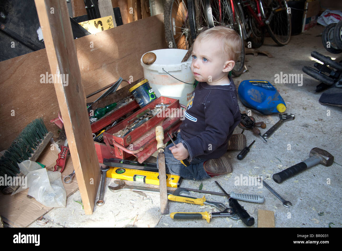 Boy with hammer hi-res stock photography and images - Alamy