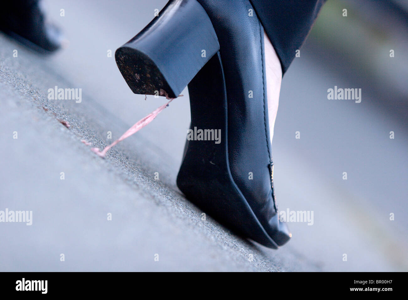 Gum stuck on high heel shoes Stock Photo - Alamy