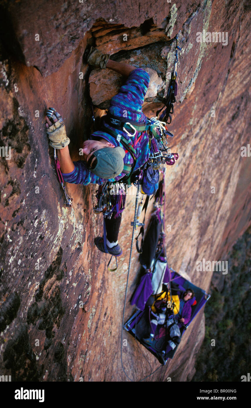 Two men climbing a multipitch route Stock Photo - Alamy