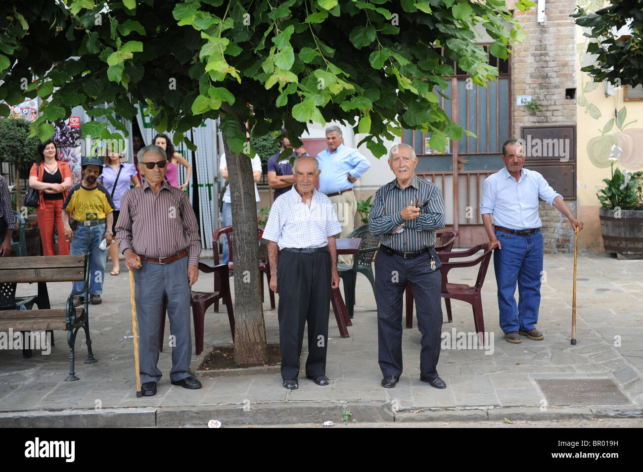 old people watching by passers Stock Photo - Alamy