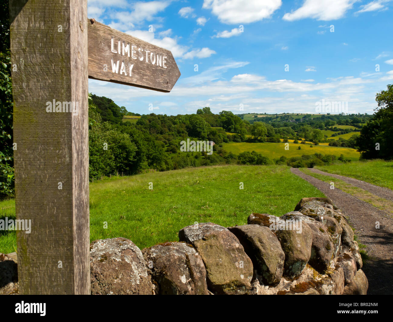 Wooden signpost on the Limestone Way a long distance bridleway in the ...