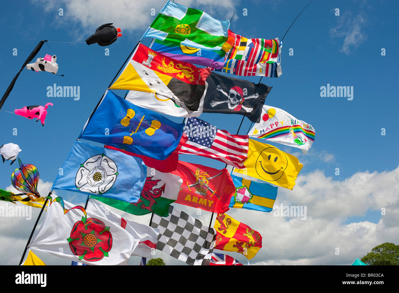 Bright colourful fun flags blue sky bold Stock Photo - Alamy