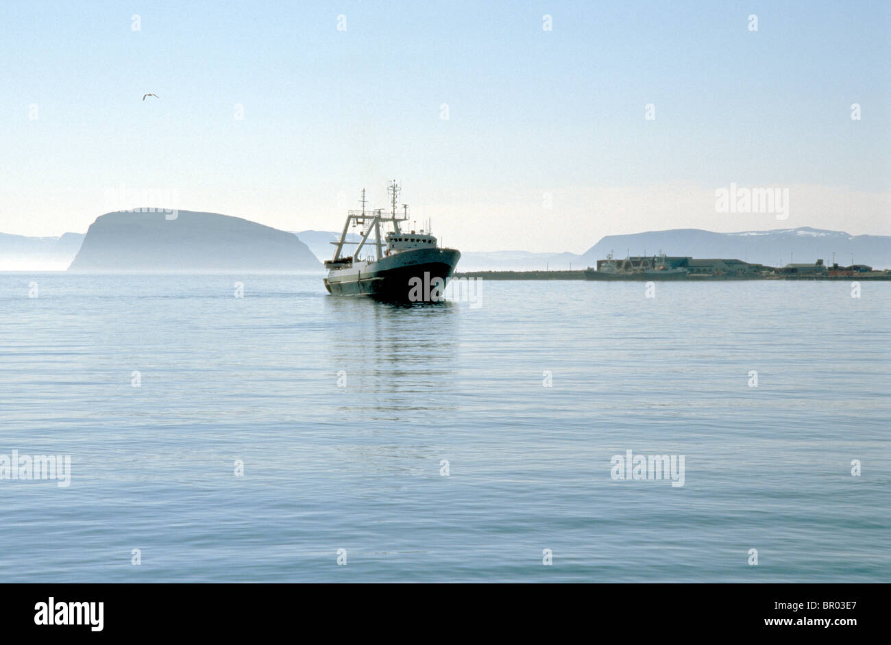 Trawler entering Hammerfest harbour, Norway Stock Photo - Alamy