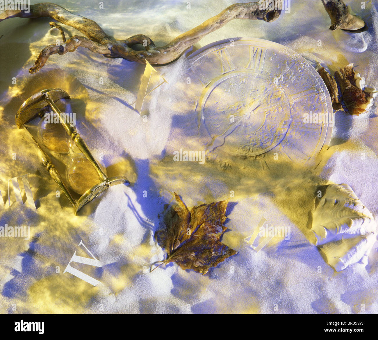 hourglass and clock in a sandy background Stock Photo - Alamy