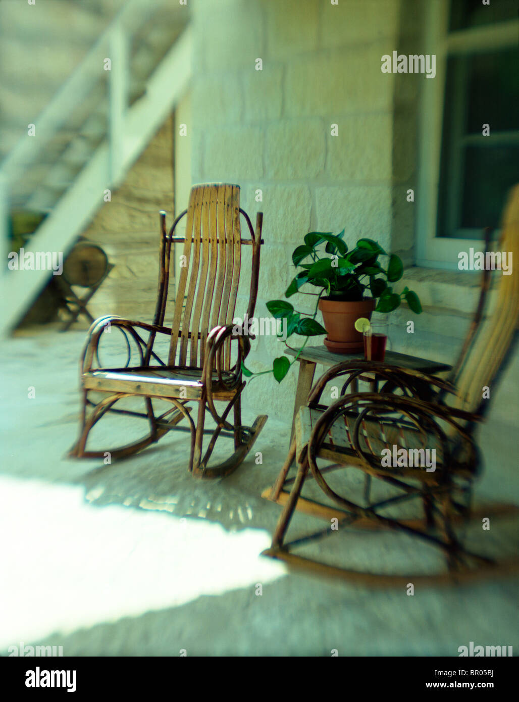 Empty rocking chairs hi-res stock photography and images - Alamy