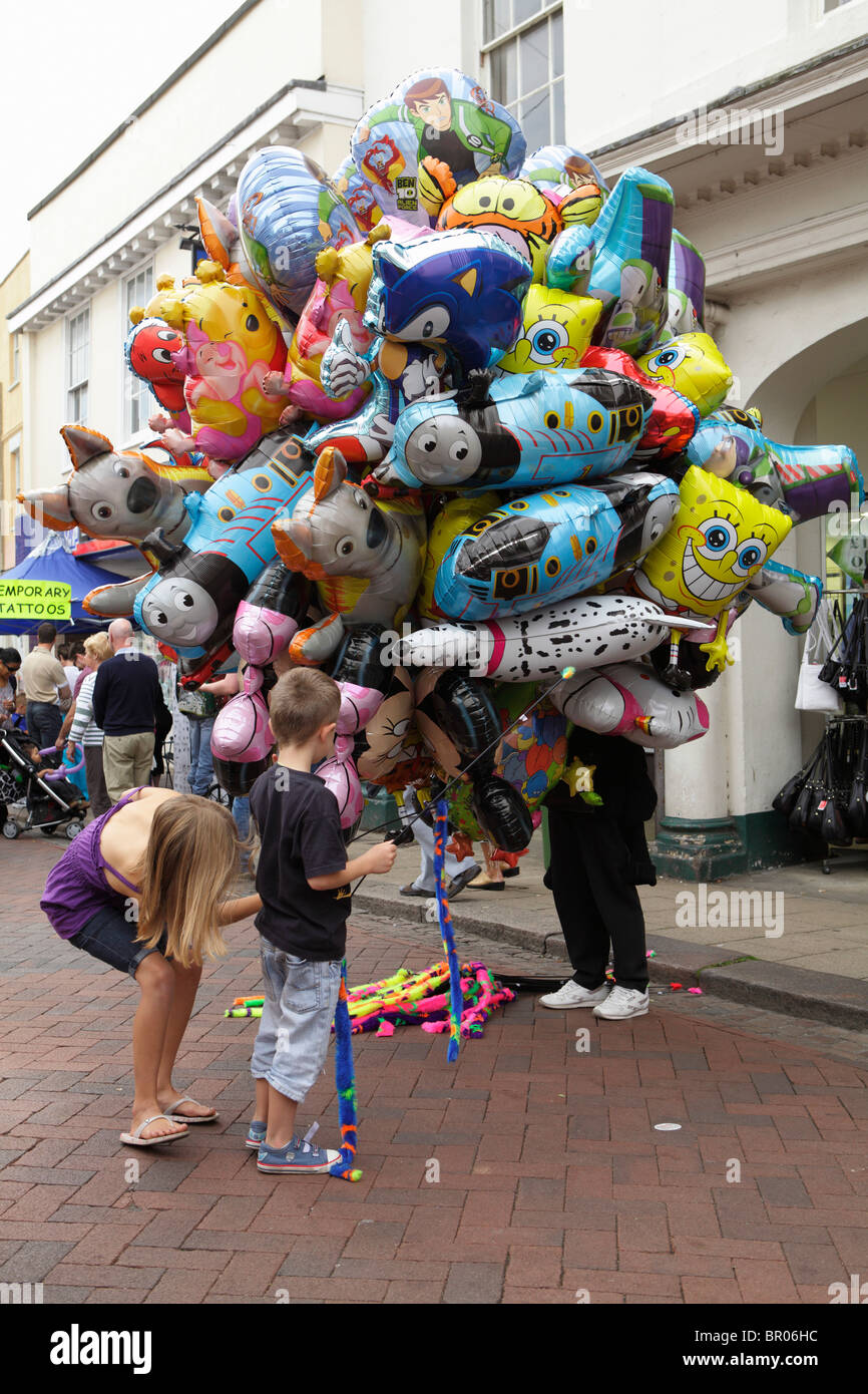 A balloon seller at Faversham hop festival Stock Photo - Alamy