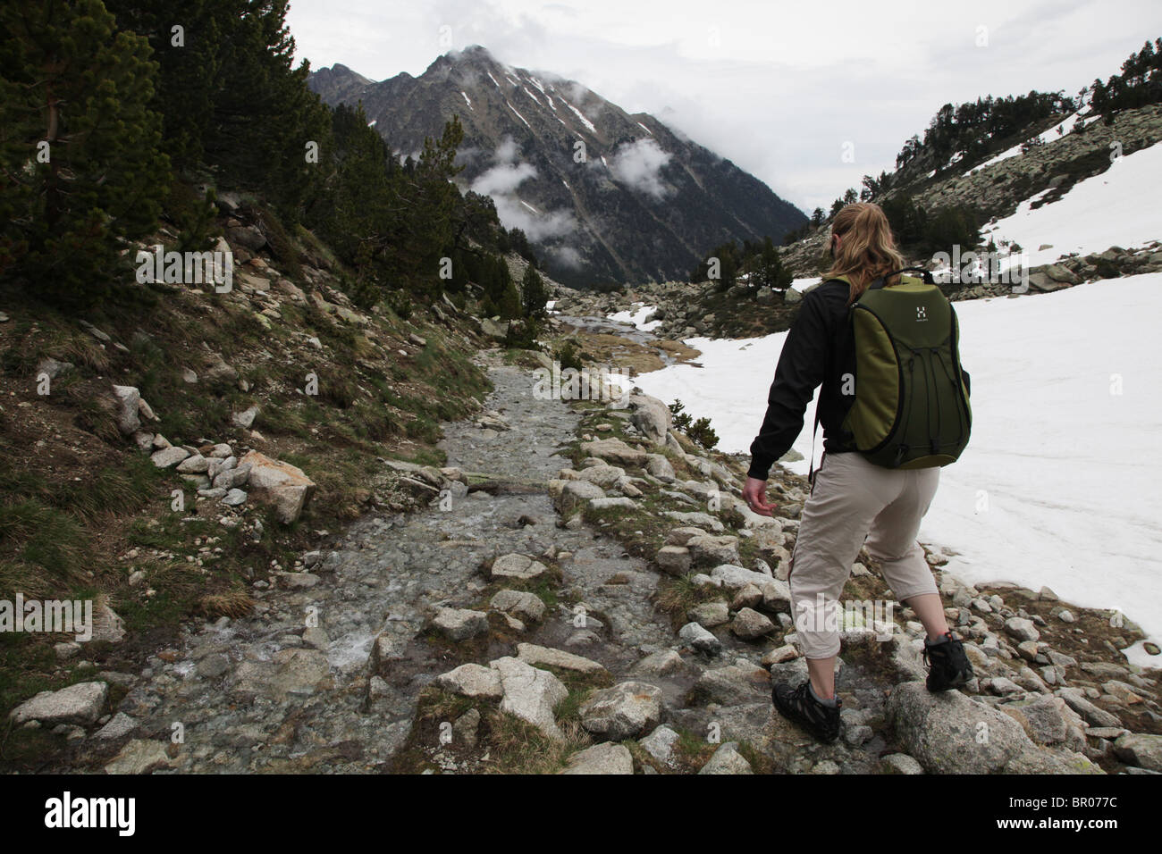 Model released walker rambler at Sant Maurici National Park descent ...