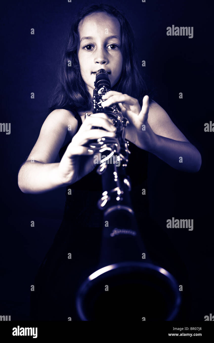 Girl playing clarinet hi-res stock photography and images - Alamy