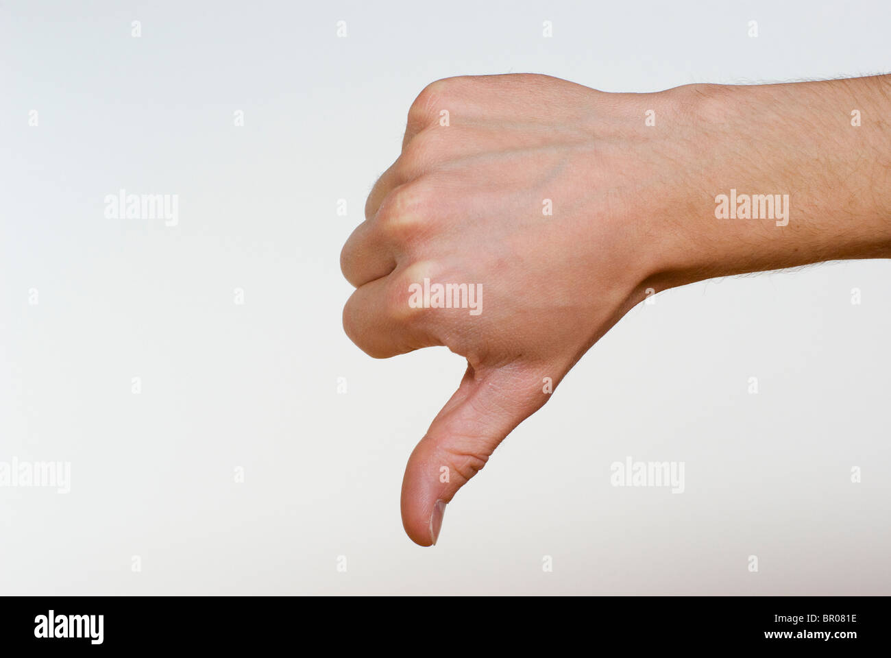 Male hand thumbs down Stock Photo - Alamy