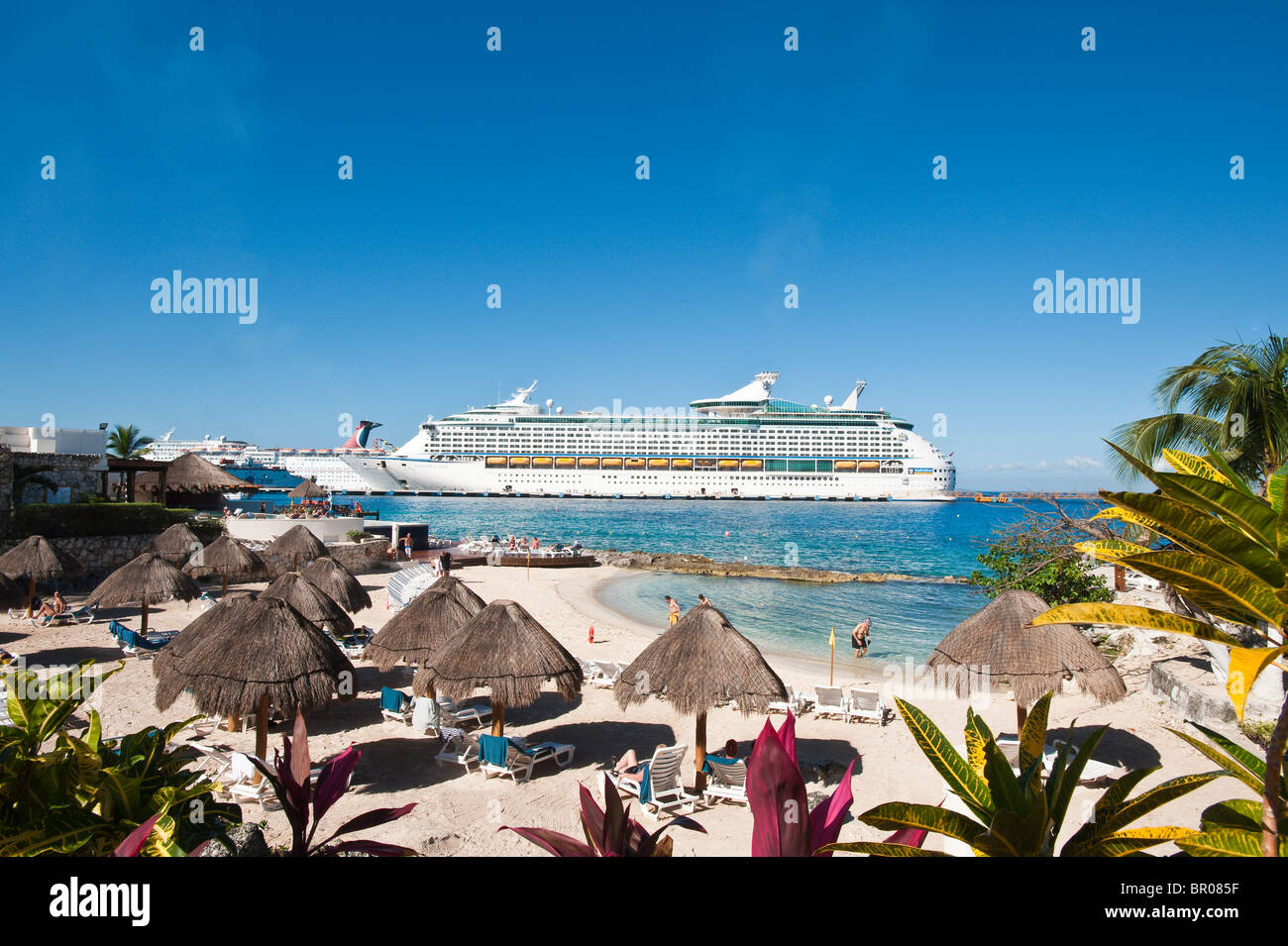 Cozumel, Mexico. Beach umbrellas and Cruise ship, San Miguel, Isla ...