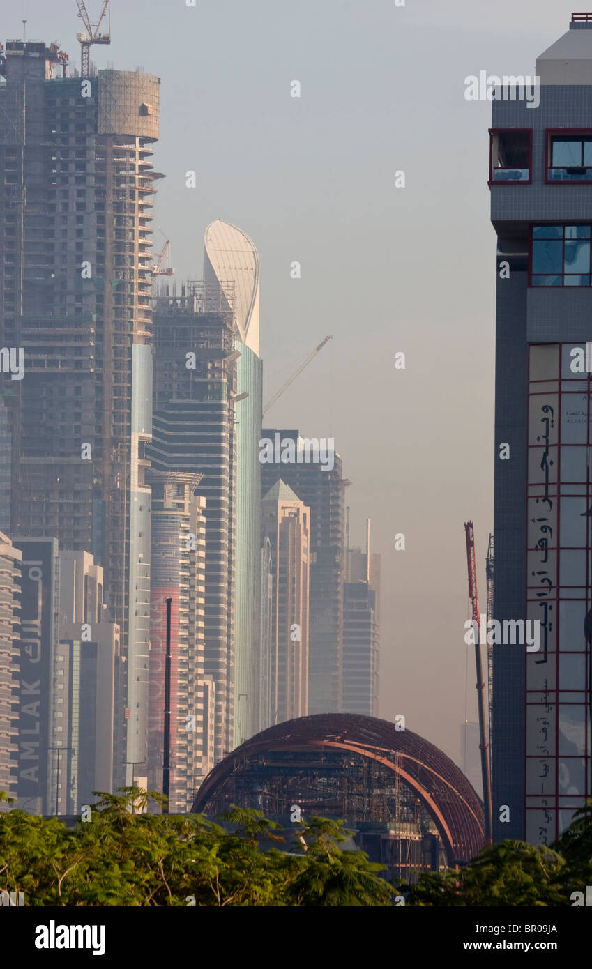 UAE, Dubai. Metro station under construction, with buildings of Sheik ...