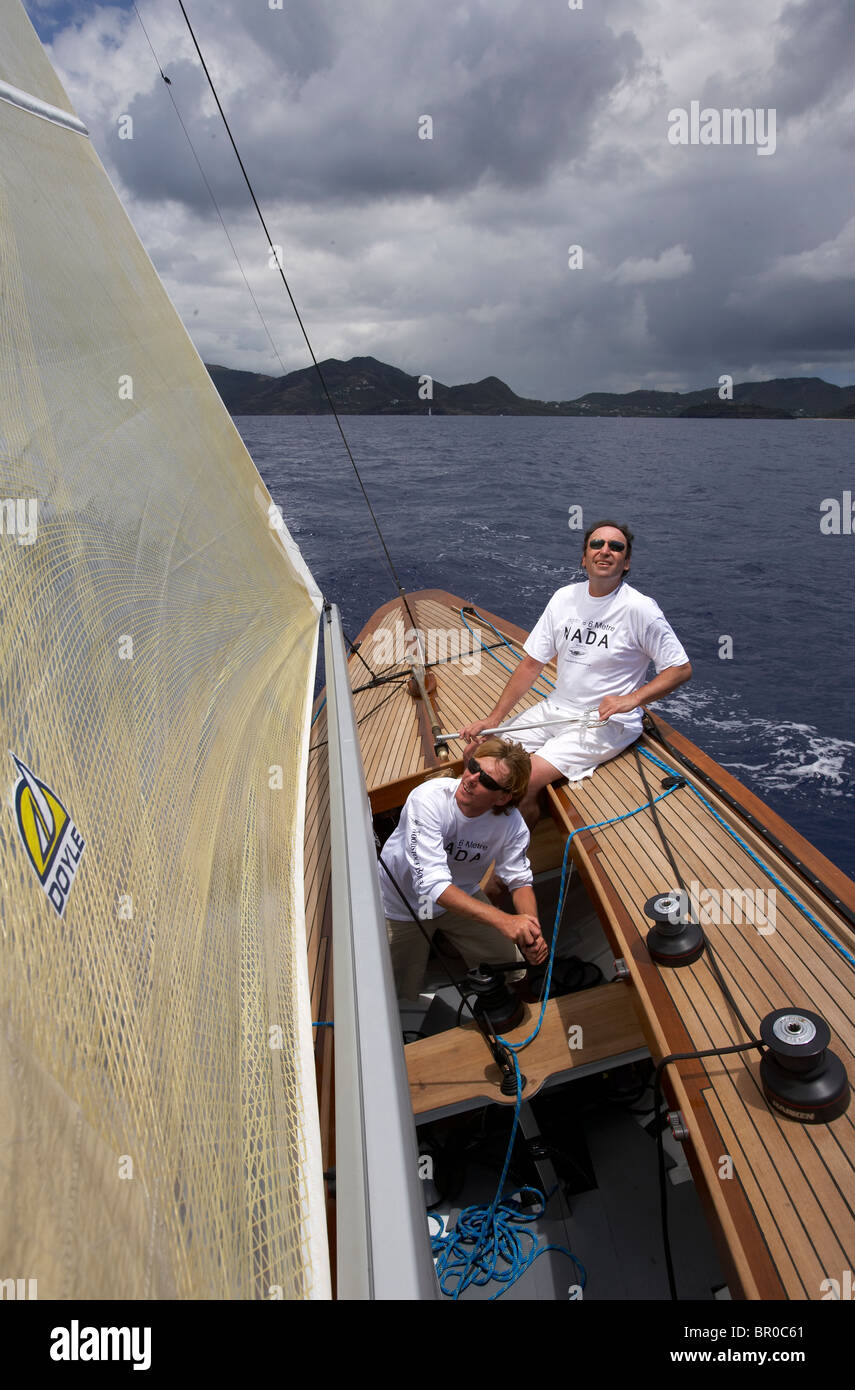 Teamwork sailing upwind Stock Photo - Alamy