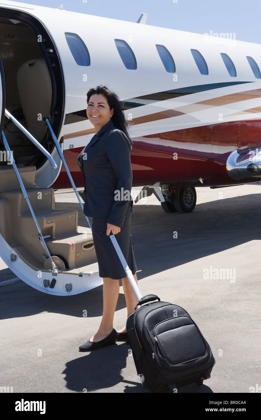 Private jet woman boarding hi-res stock photography and images - Alamy