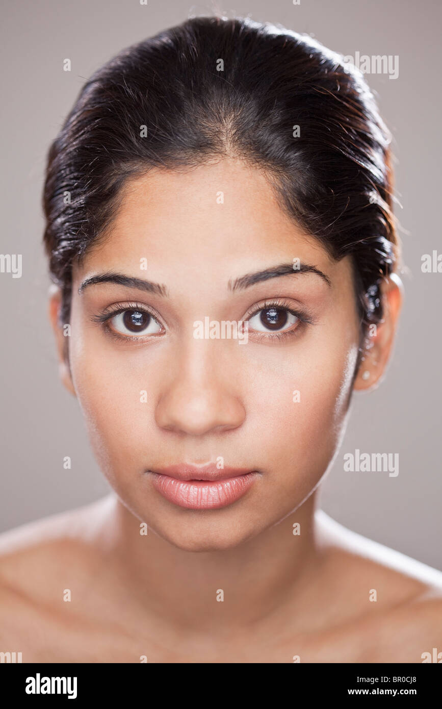 Serious Hispanic woman Stock Photo - Alamy