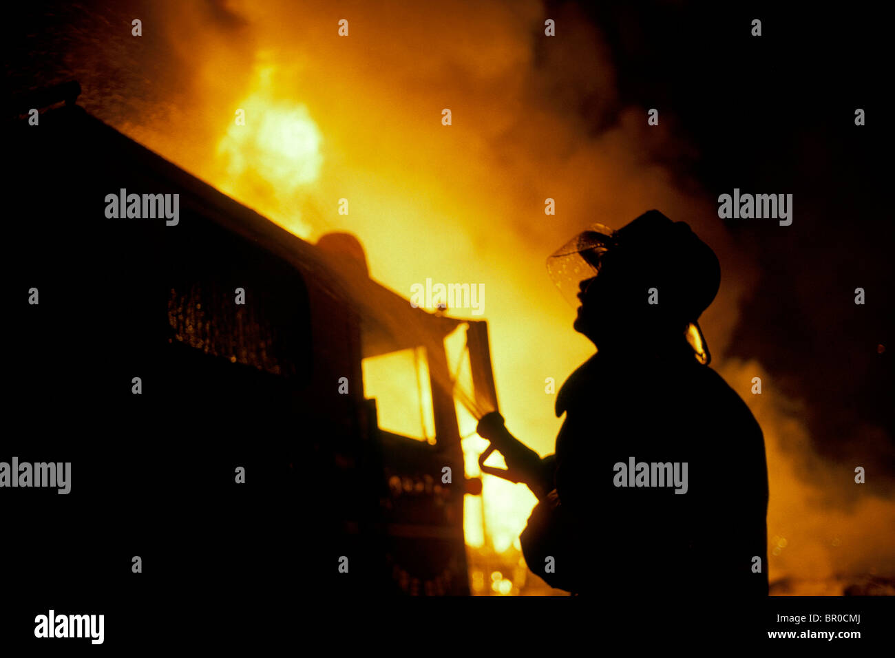 Dramatic fire fighting hi-res stock photography and images - Alamy