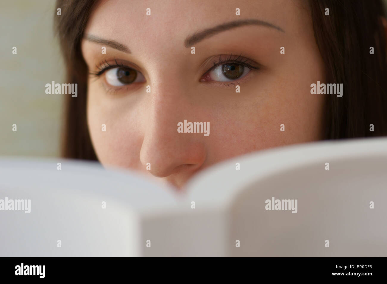 Reading an open book hi-res stock photography and images - Alamy