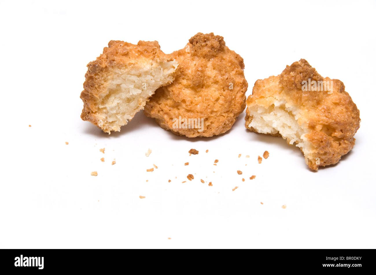 Three coco biscuits with bites and crumbs Stock Photo - Alamy