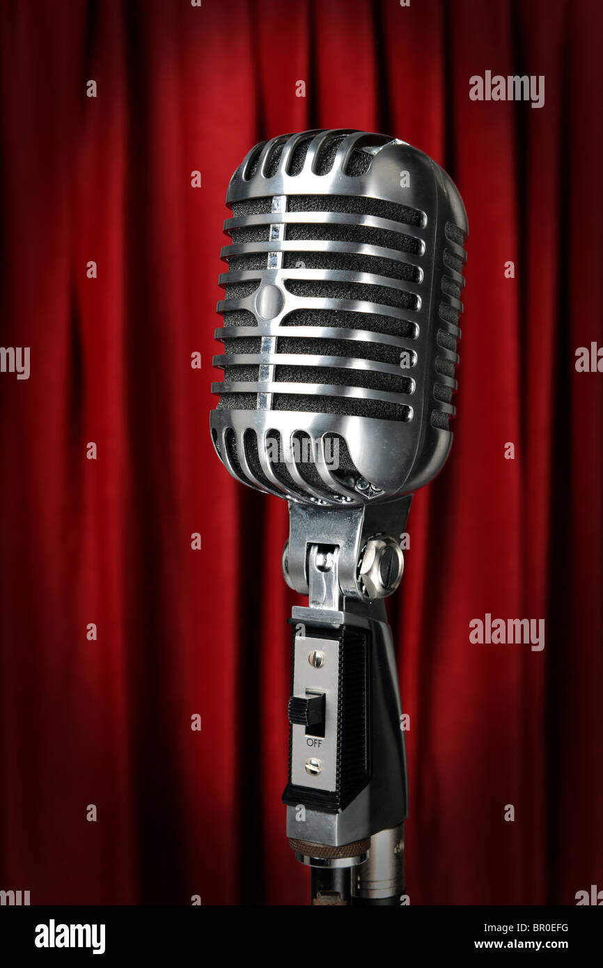 Vintage microphone with red curtain in background Stock Photo - Alamy