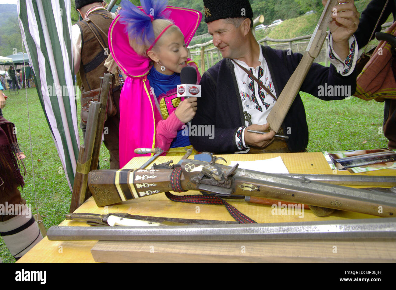 Television interviews leading master of ancient weapons Stock Photo - Alamy