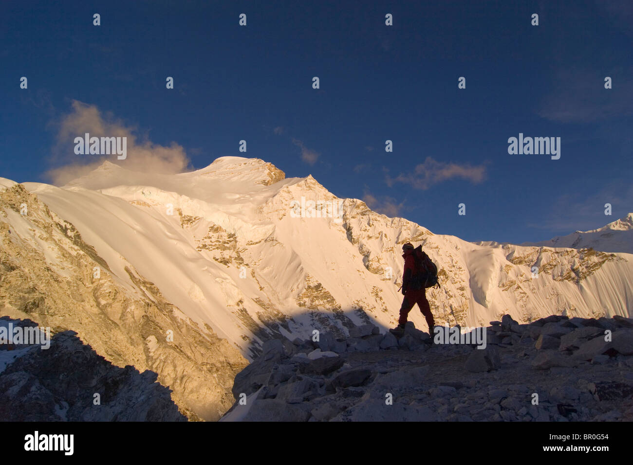 A Man Climbing on a Mountain in the Himalayas Stock Photo - Alamy